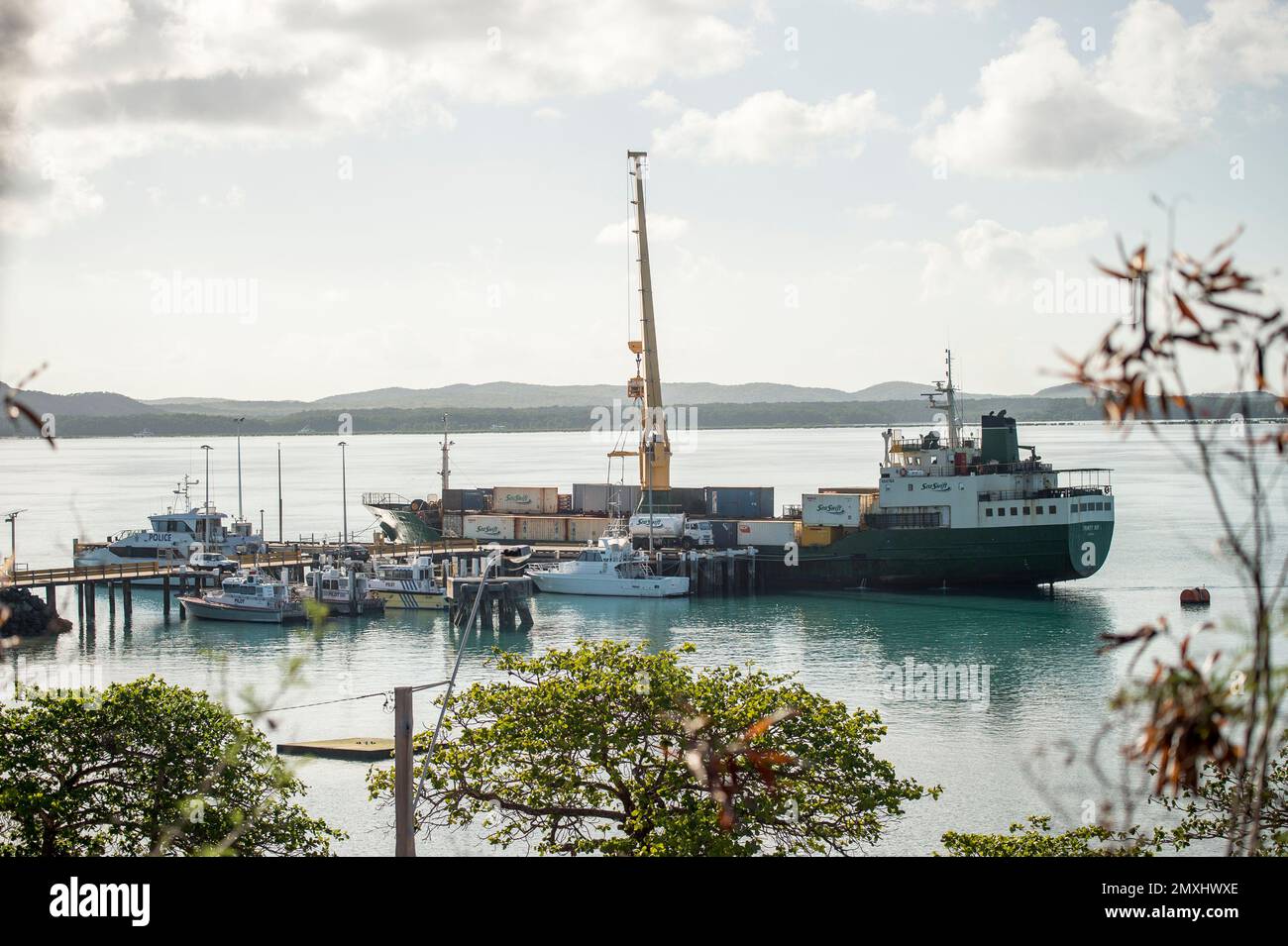 Freight jetty, with ship being unloaded at Thursday Island, Torres ...