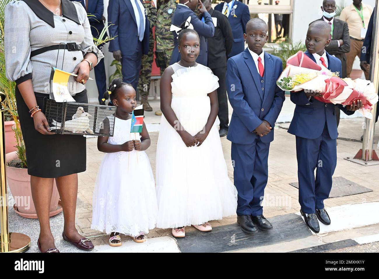 A crowd gathers to welcome Pope Francis upon his arrival at the Juba ...