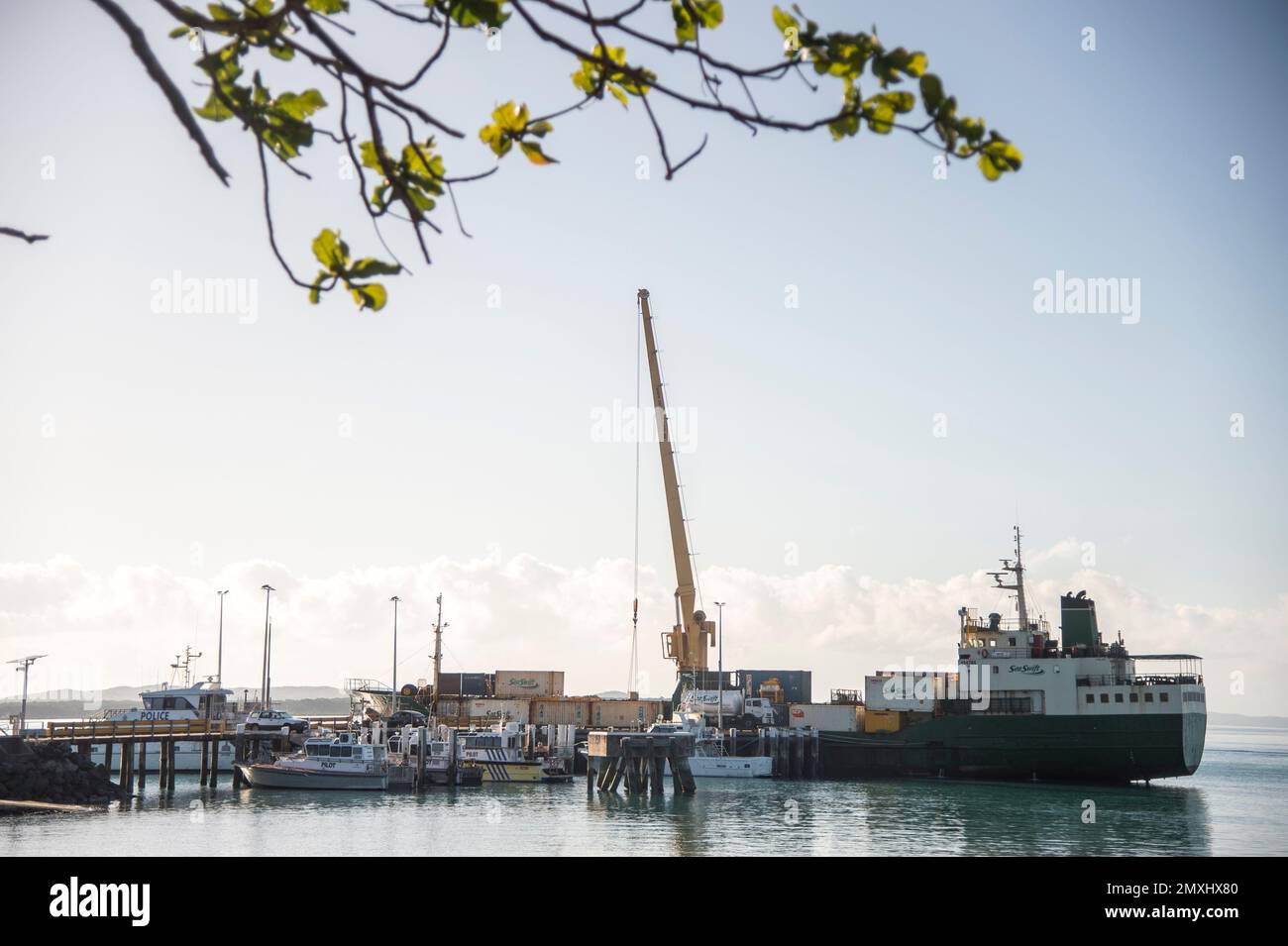 Thursday Island freight jetty, with ship being unloaded, Torres Strait ...