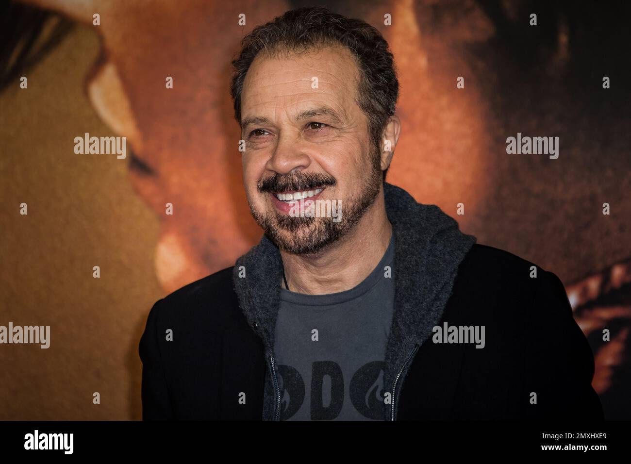 Edward Zwick poses for photographers upon arrival at the premiere of ...