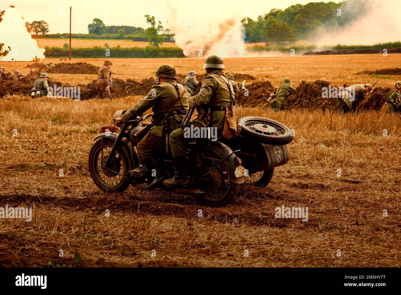 The two dispatch riders riding a motorcycle on a battle during a war ...
