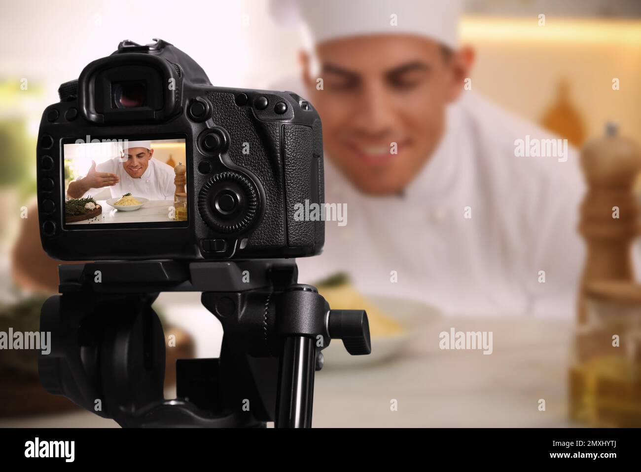 Food photography. Shooting of chef with dish, focus on camera Stock ...