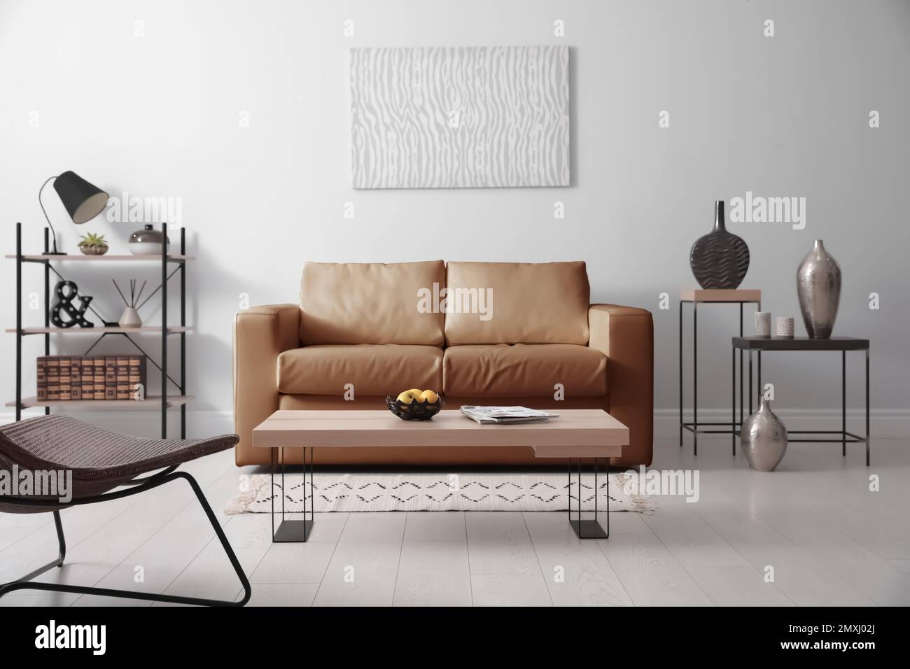 Modern living room interior with stylish leather sofa Stock Photo - Alamy
