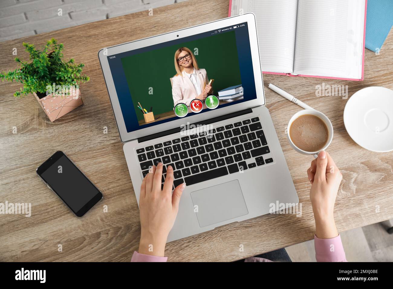 Distance learning, online school lesson. Girl studying at home during ...