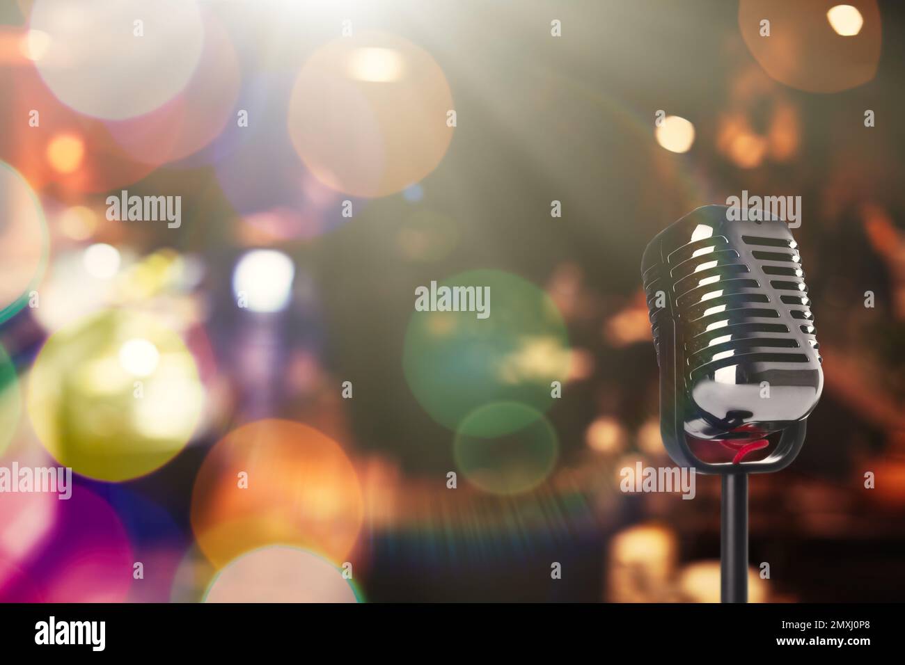 Vintage microphone in karaoke club. Space for text Stock Photo - Alamy