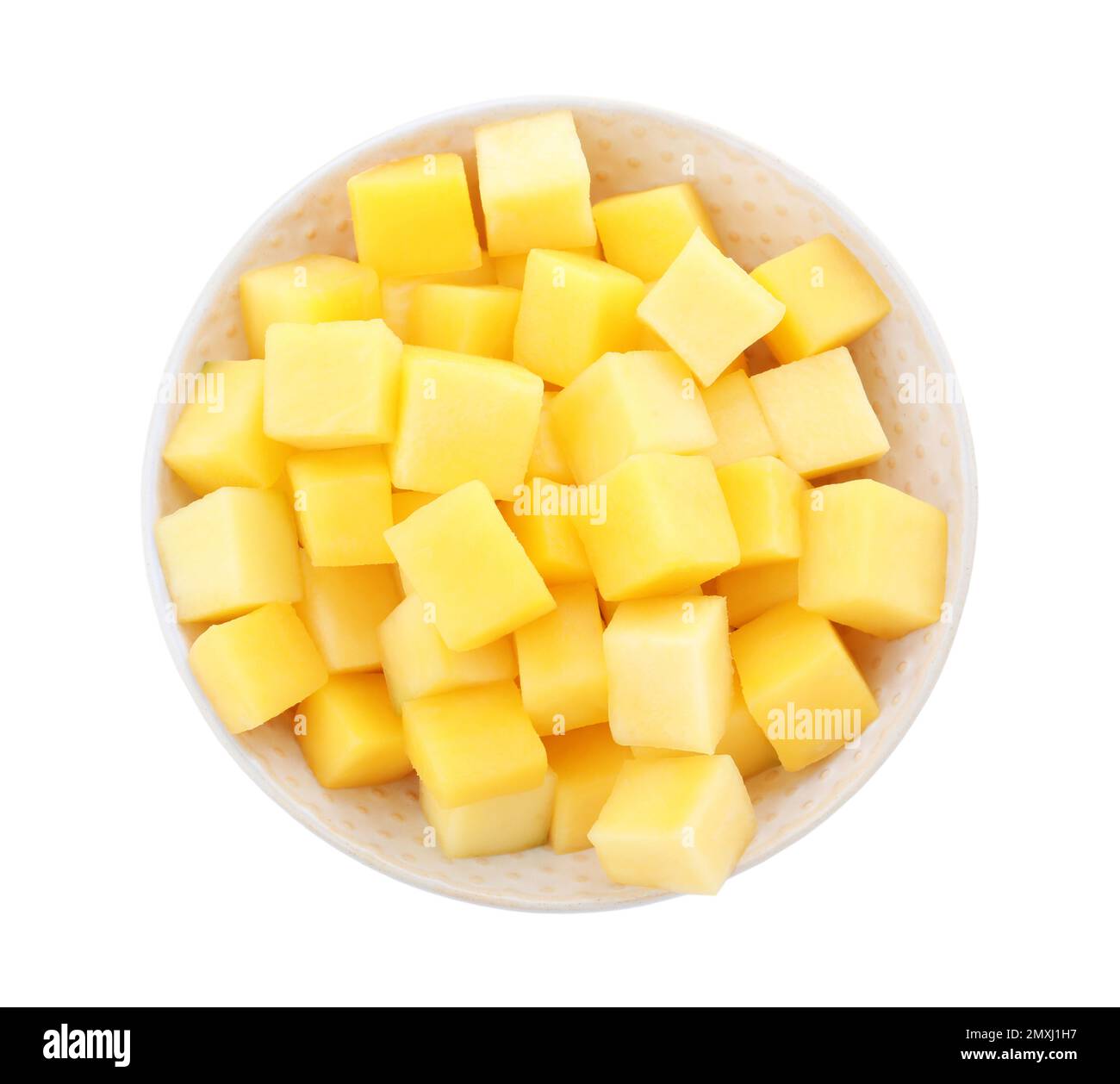 Tasty mango cubes in ceramic bowl isolated on white, top view Stock ...