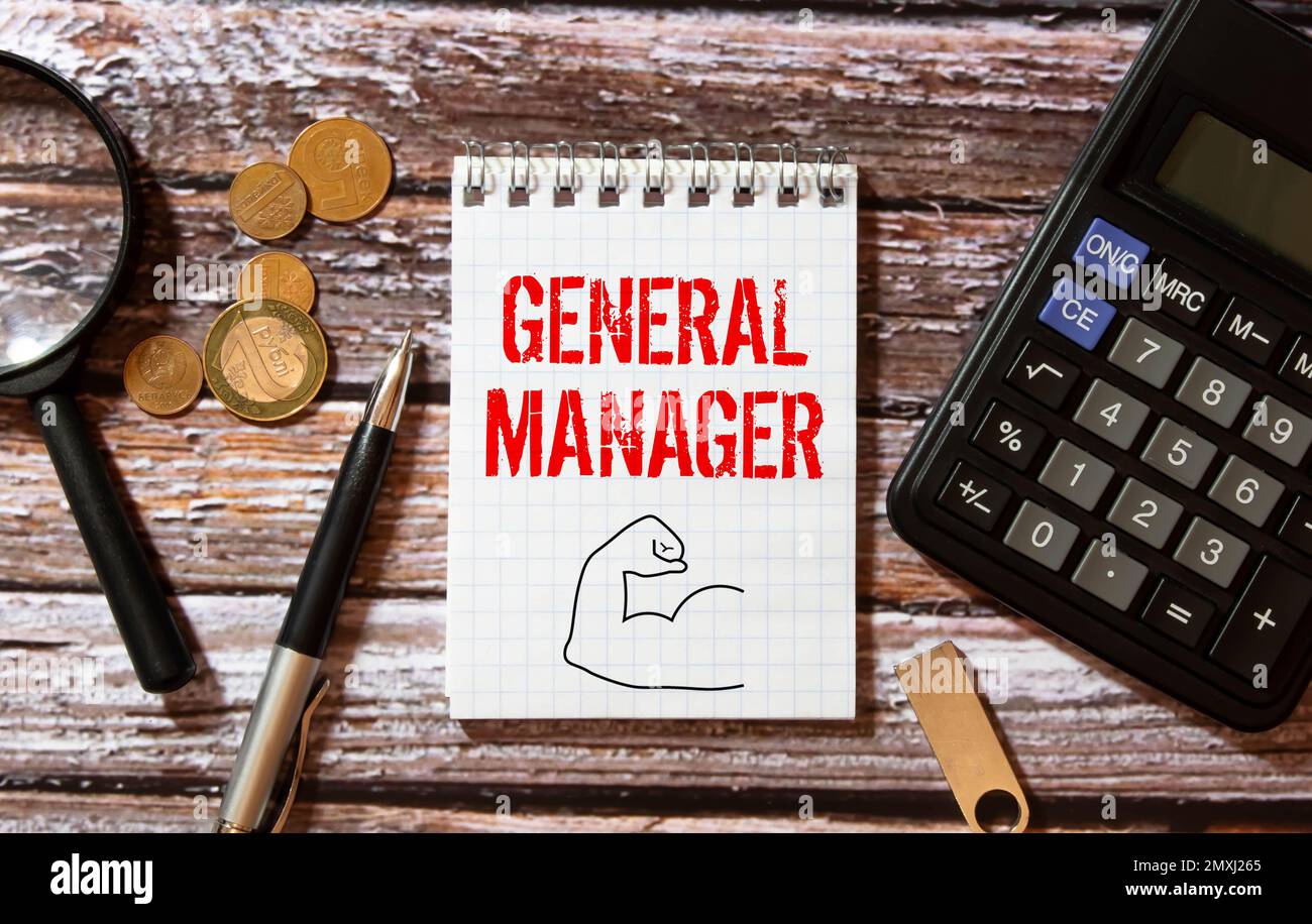 Sticker with the text GENERAL MANAGER on white background, near ...
