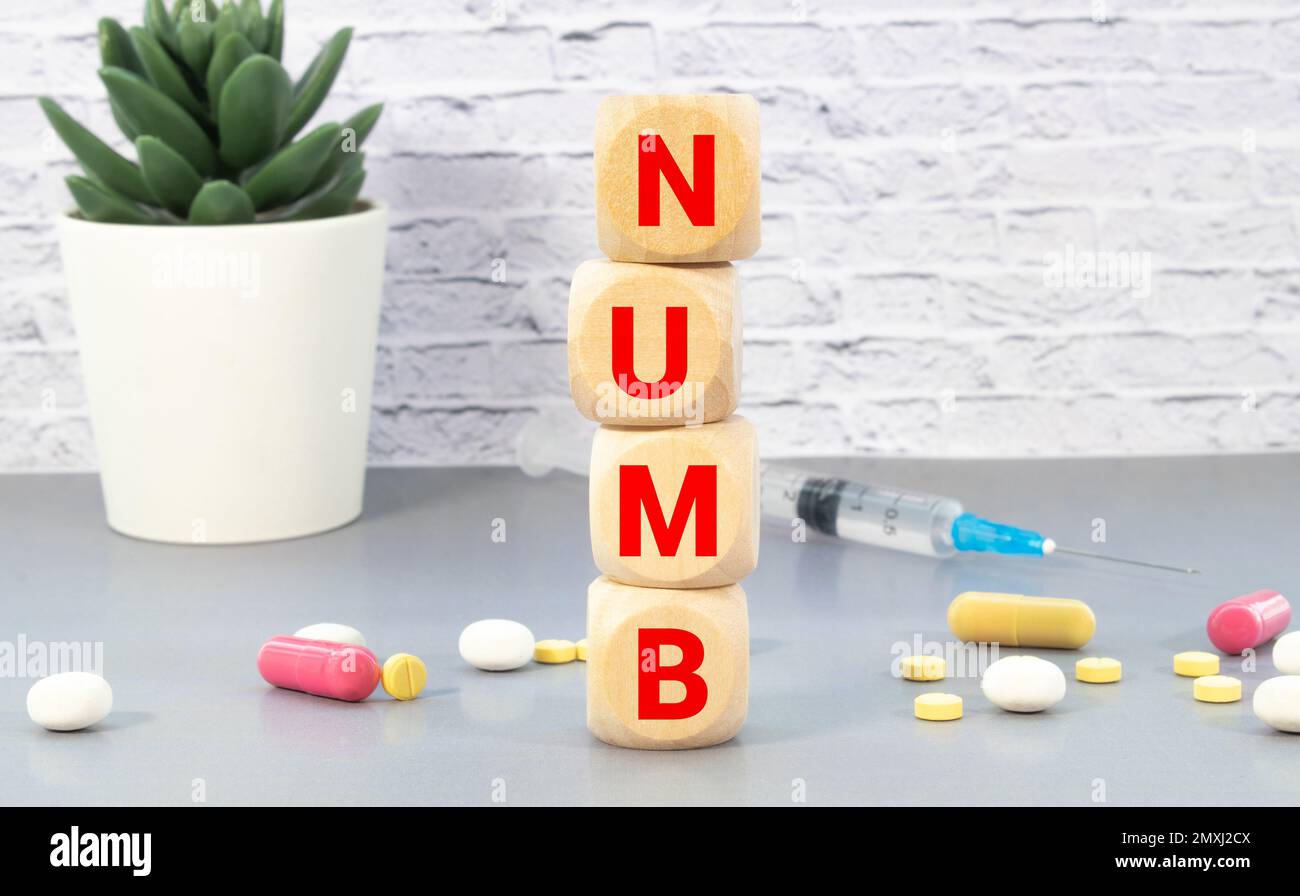 NUMB word made with building blocks isolated on white Stock Photo - Alamy
