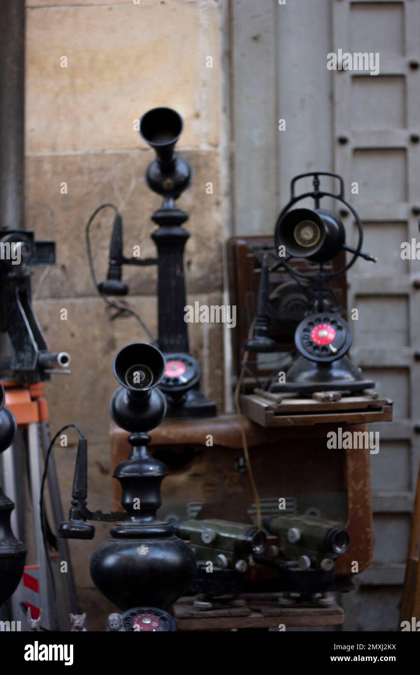 Three vintage phones on display outdoors Stock Photo - Alamy