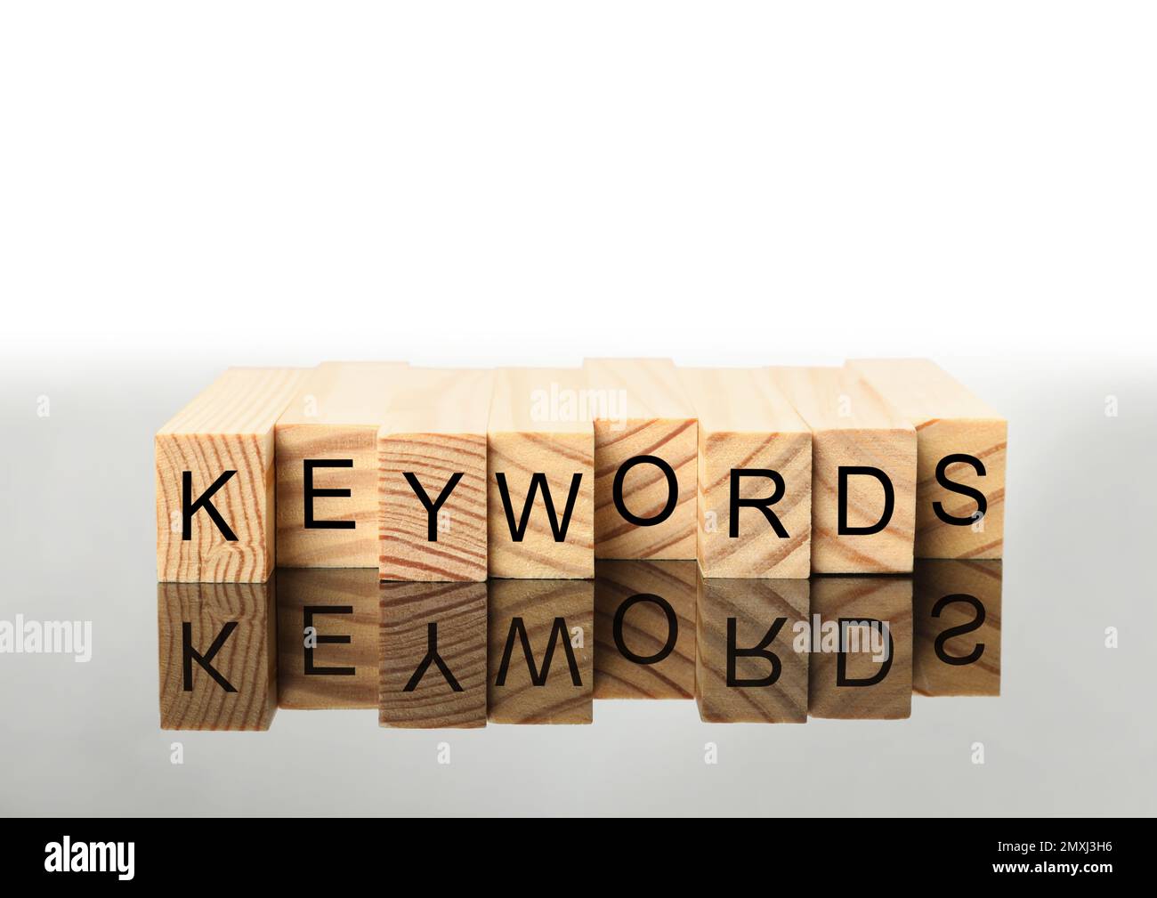 Word KEYWORDS made of wooden blocks on white background Stock Photo - Alamy