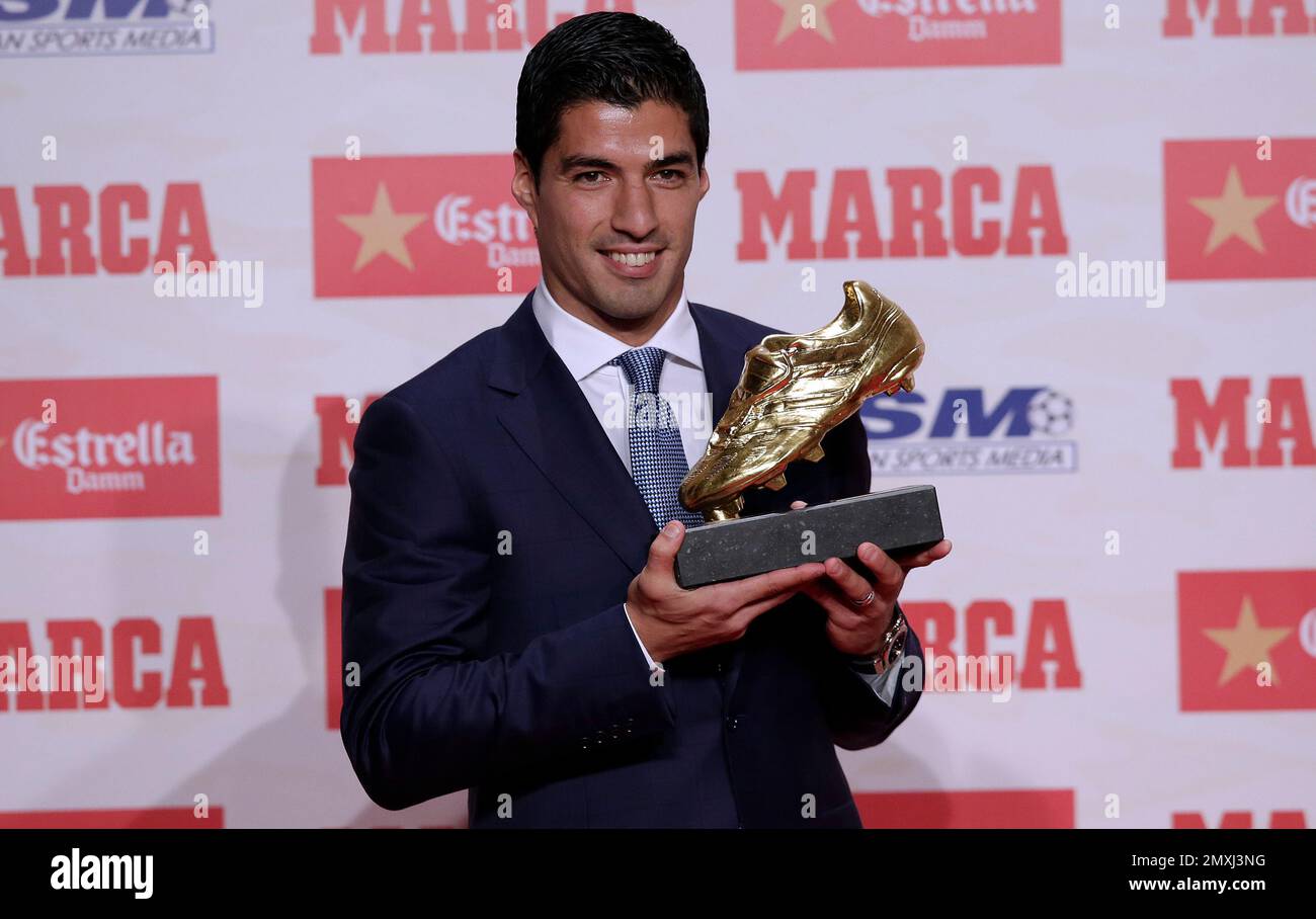 FC Barcelona's Luis Suarez, from Uruguay, poses to the media after ...
