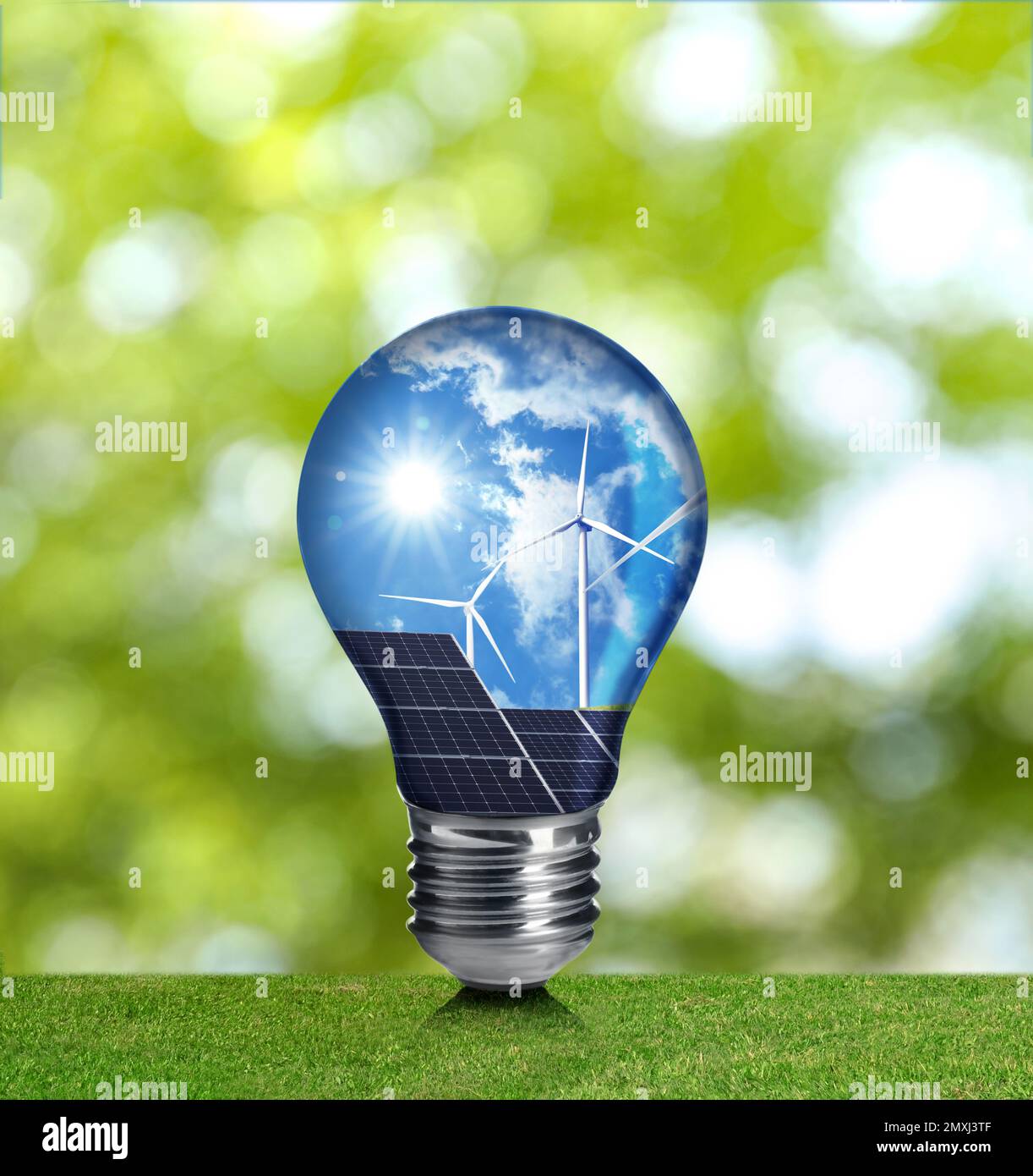 Alternative energy source. Light bulb with solar panels and wind ...