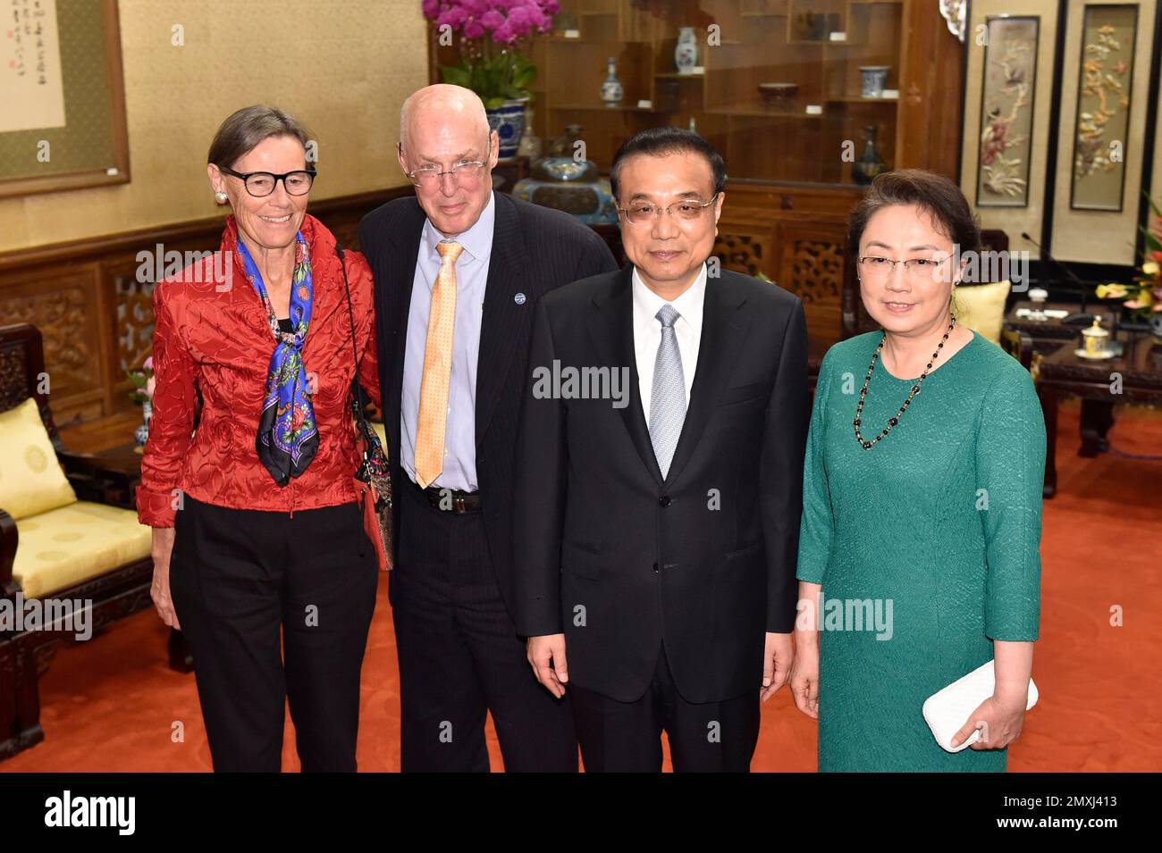 Former U.S. Treasury Secretary Henry Paulson, second from left, and ...