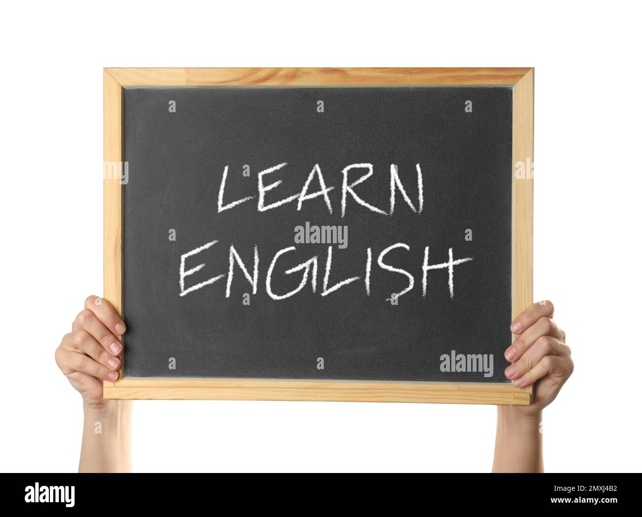 Woman holding blackboard with text Learn English on white background ...
