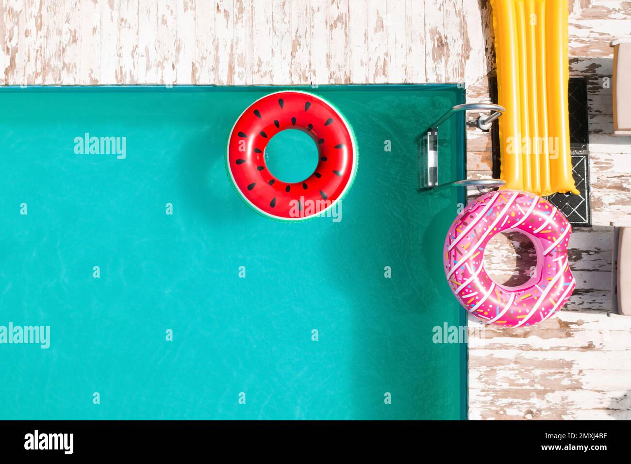 Top view of inflatable rings and swimming pool. Summer vacation Stock ...