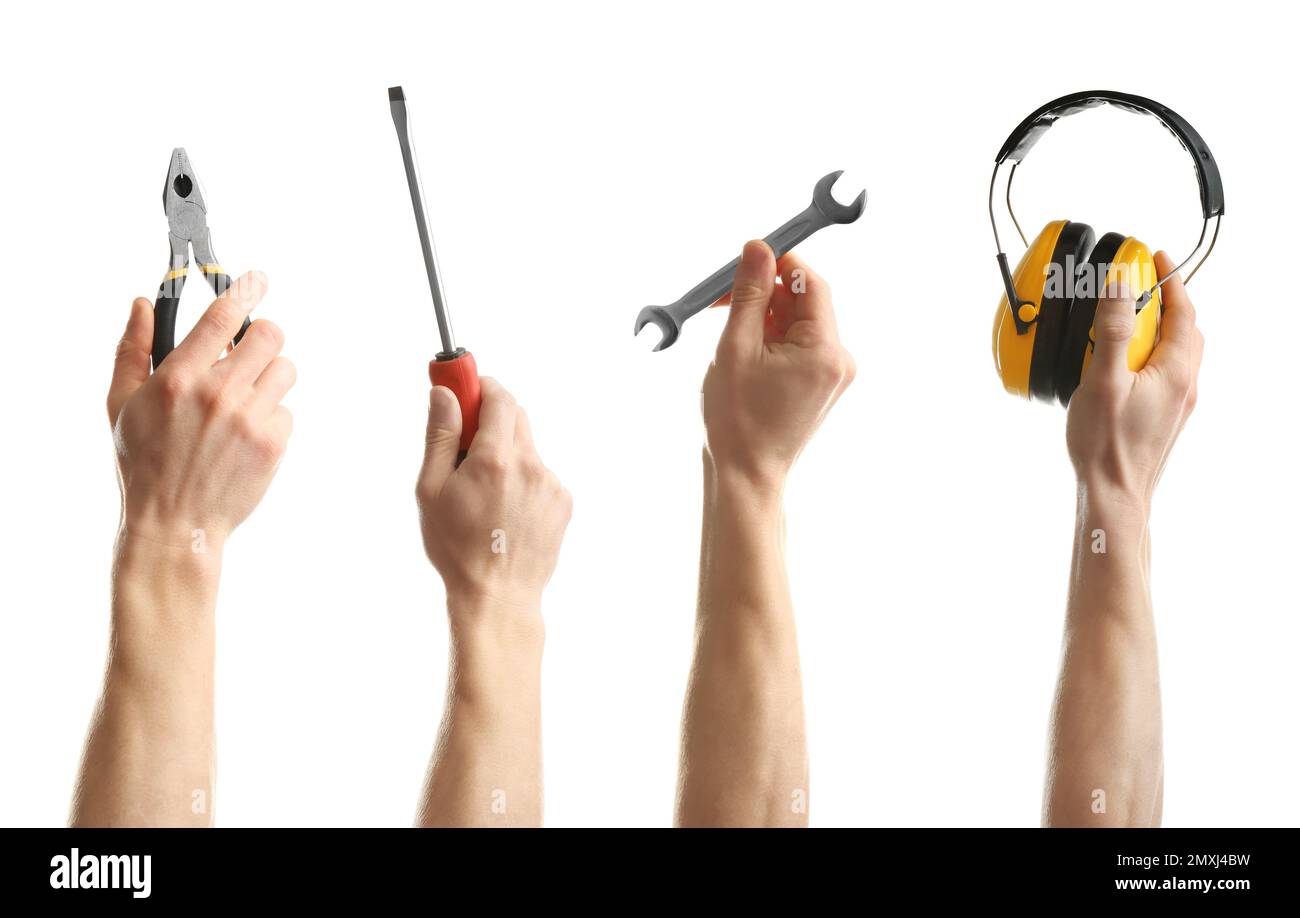 Holding various tools Cut Out Stock Images & Pictures - Alamy