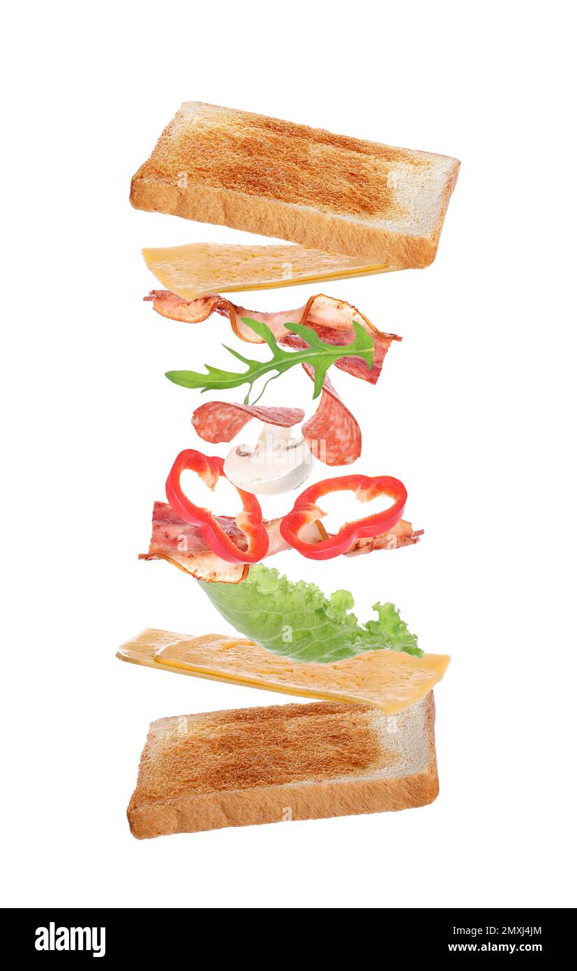 Delicious sandwich with flying toasted bread, fried bacon and other ...