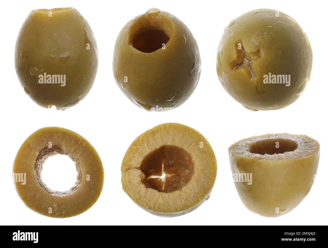 Delicious cut and whole green olives on white background Stock Photo ...