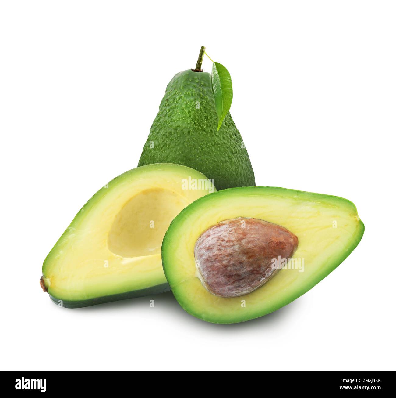 Cut and whole fresh avocados on white background Stock Photo - Alamy