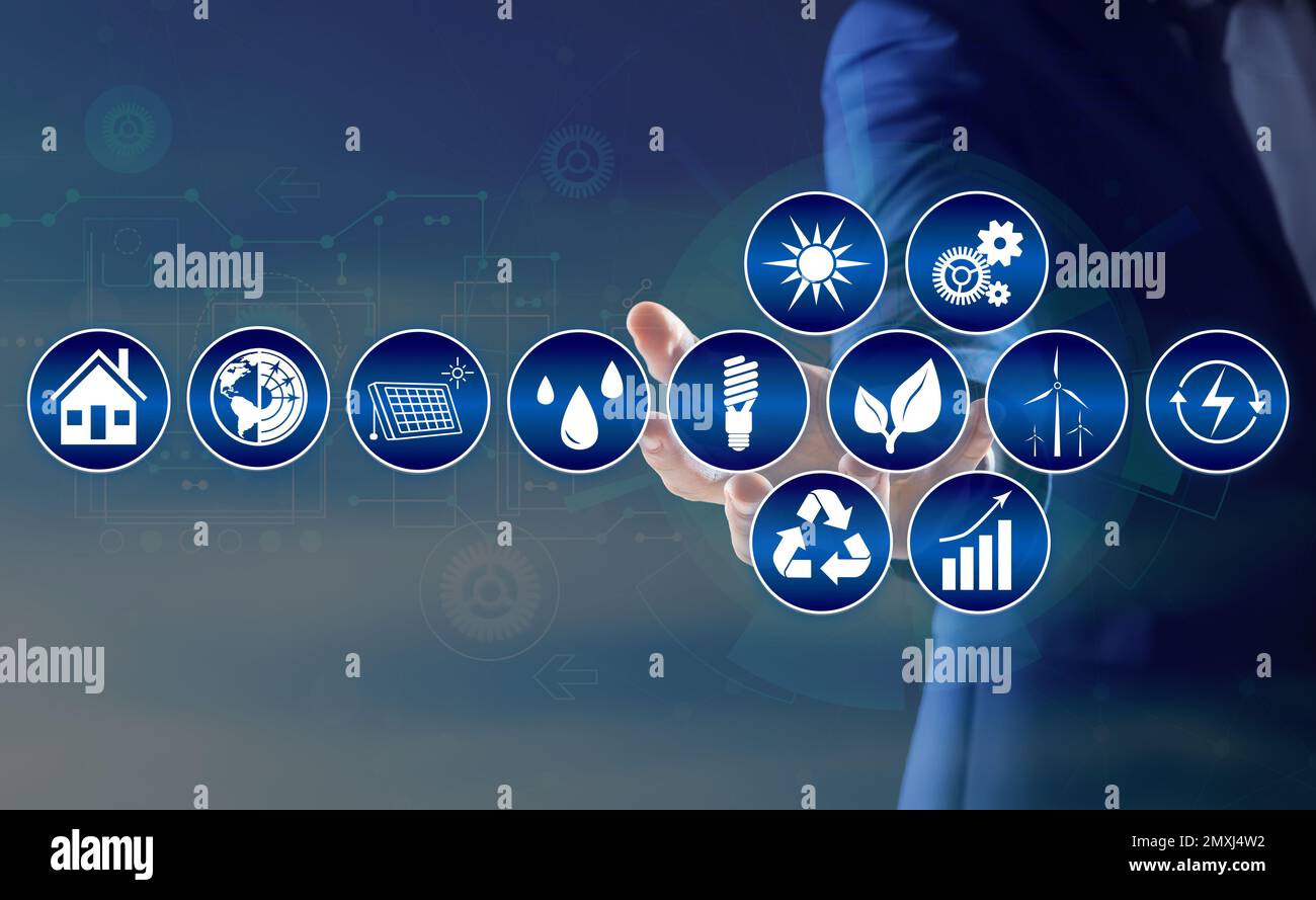 Energy efficiency concept. Man demonstrating scheme with icons, closeup ...