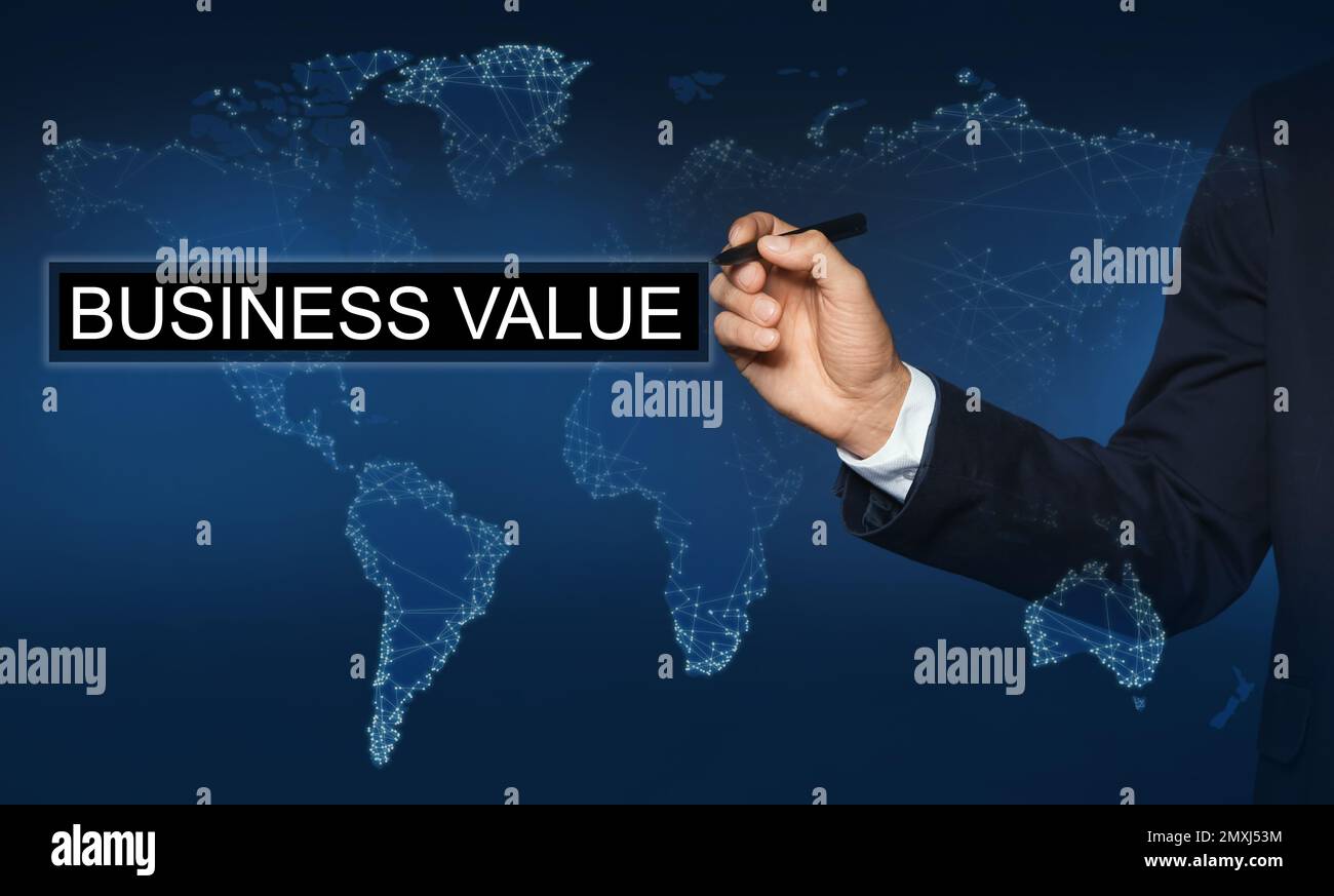 Business value concept. Man using virtual screen Stock Photo - Alamy Business value concept. Man using virtual screen Stock Photo - Alamy