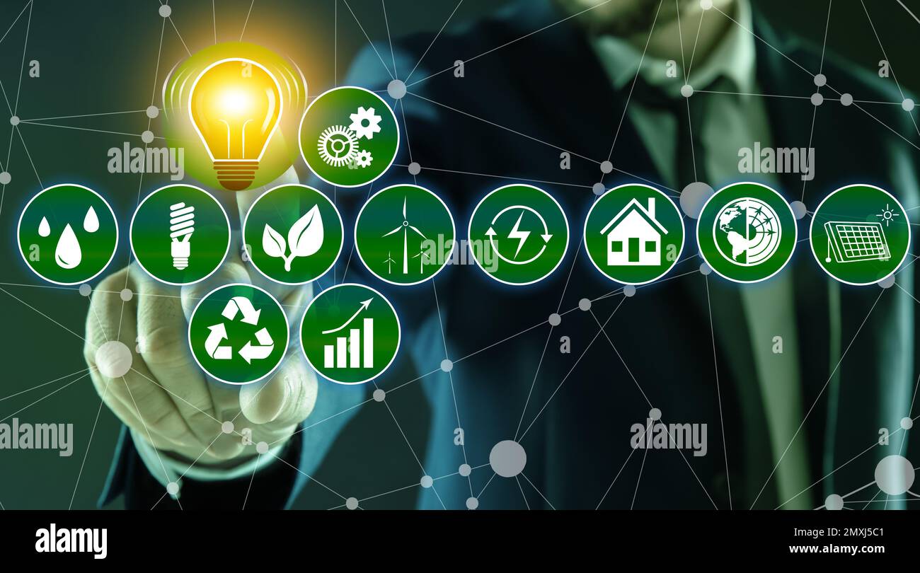 Energy efficiency concept. Man demonstrating scheme with icons, closeup ...
