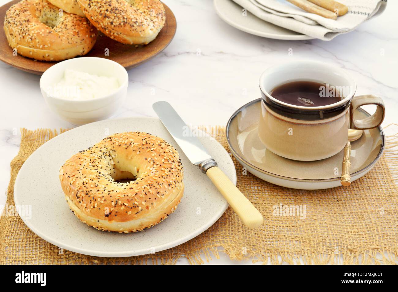 Fresh bagels and cream cheese for coffee break in horizontal format and ...