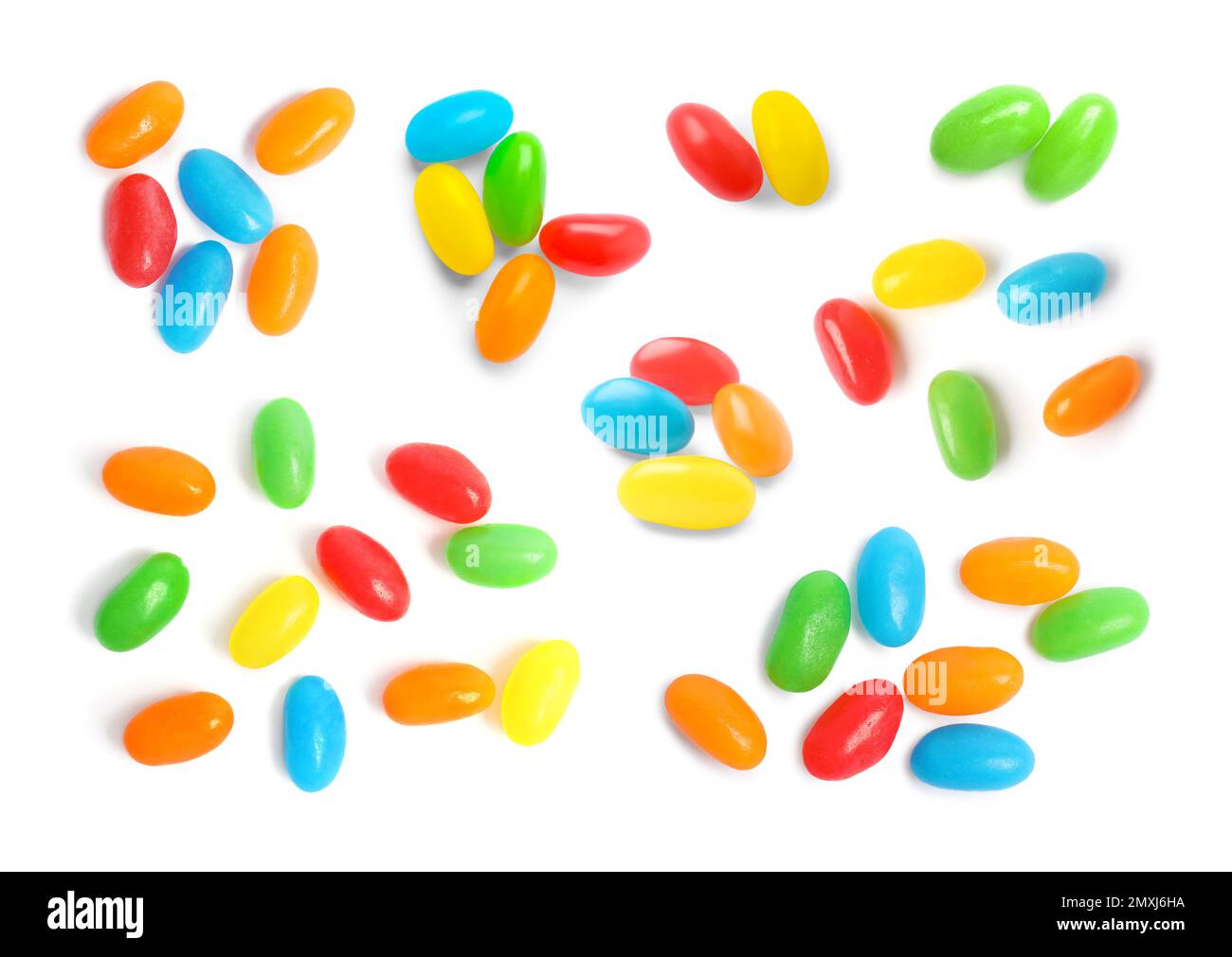 Set with delicious color jelly beans on white background, top view ...