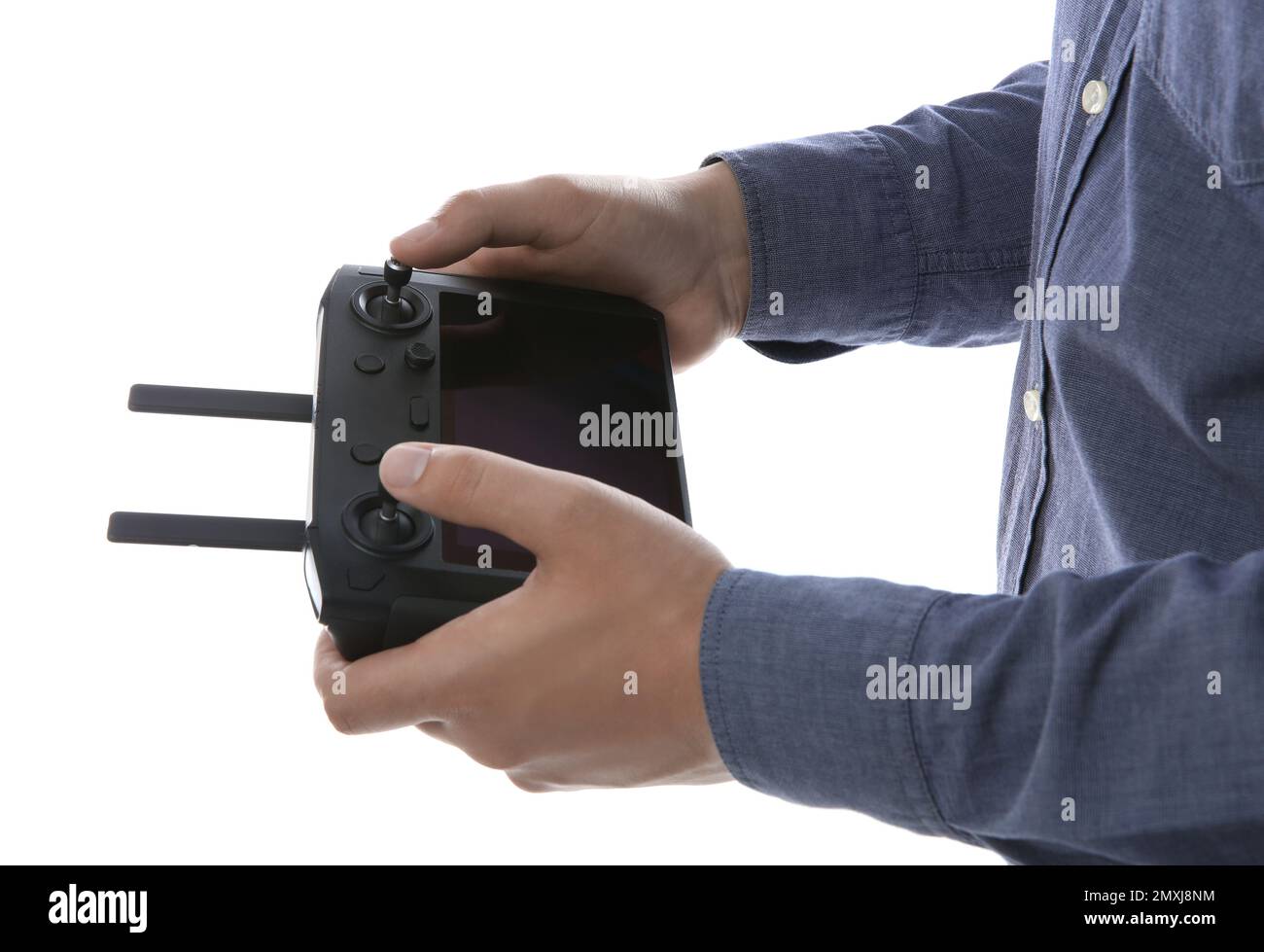 Man holding new modern drone controller on white background, closeup of ...