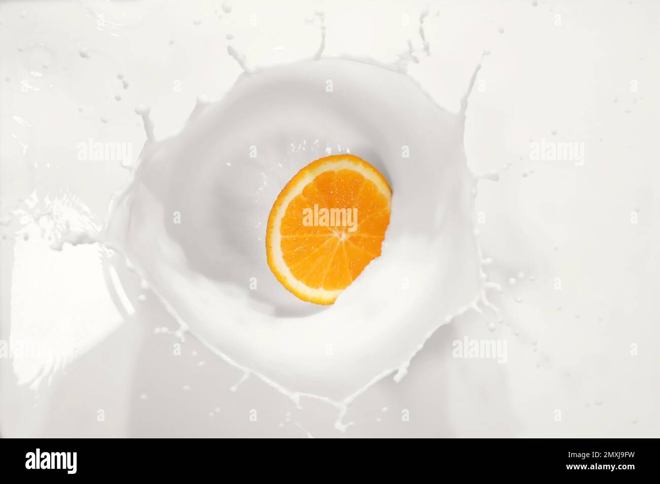 Orange falling into hi-res stock photography and images - Alamy