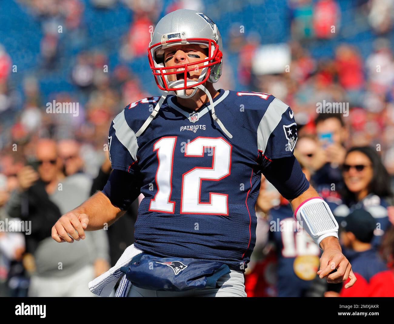 New England Patriots quarterback Tom Brady takes the field before their ...