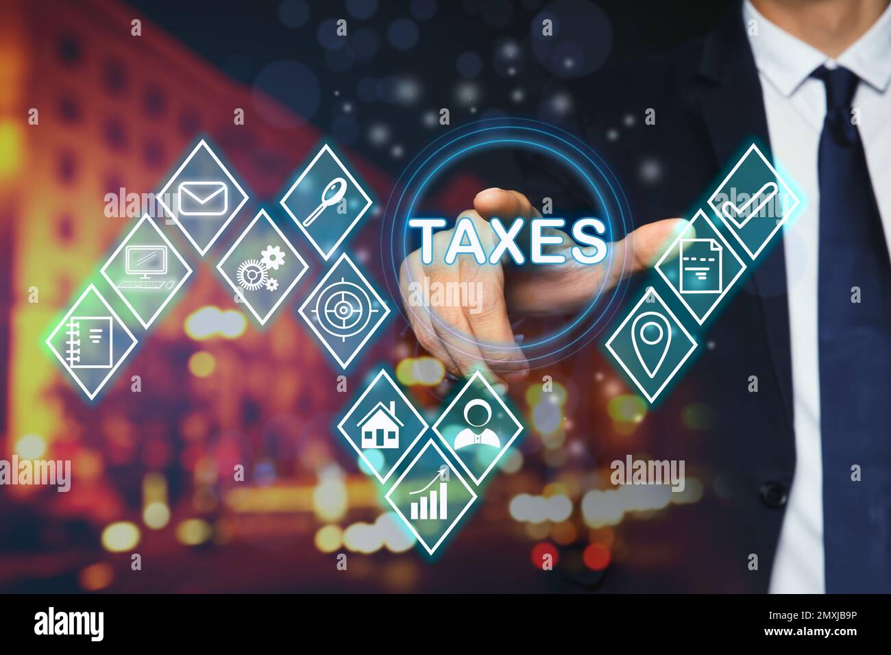 Tax concept. Man using virtual screen, closeup Stock Photo - Alamy