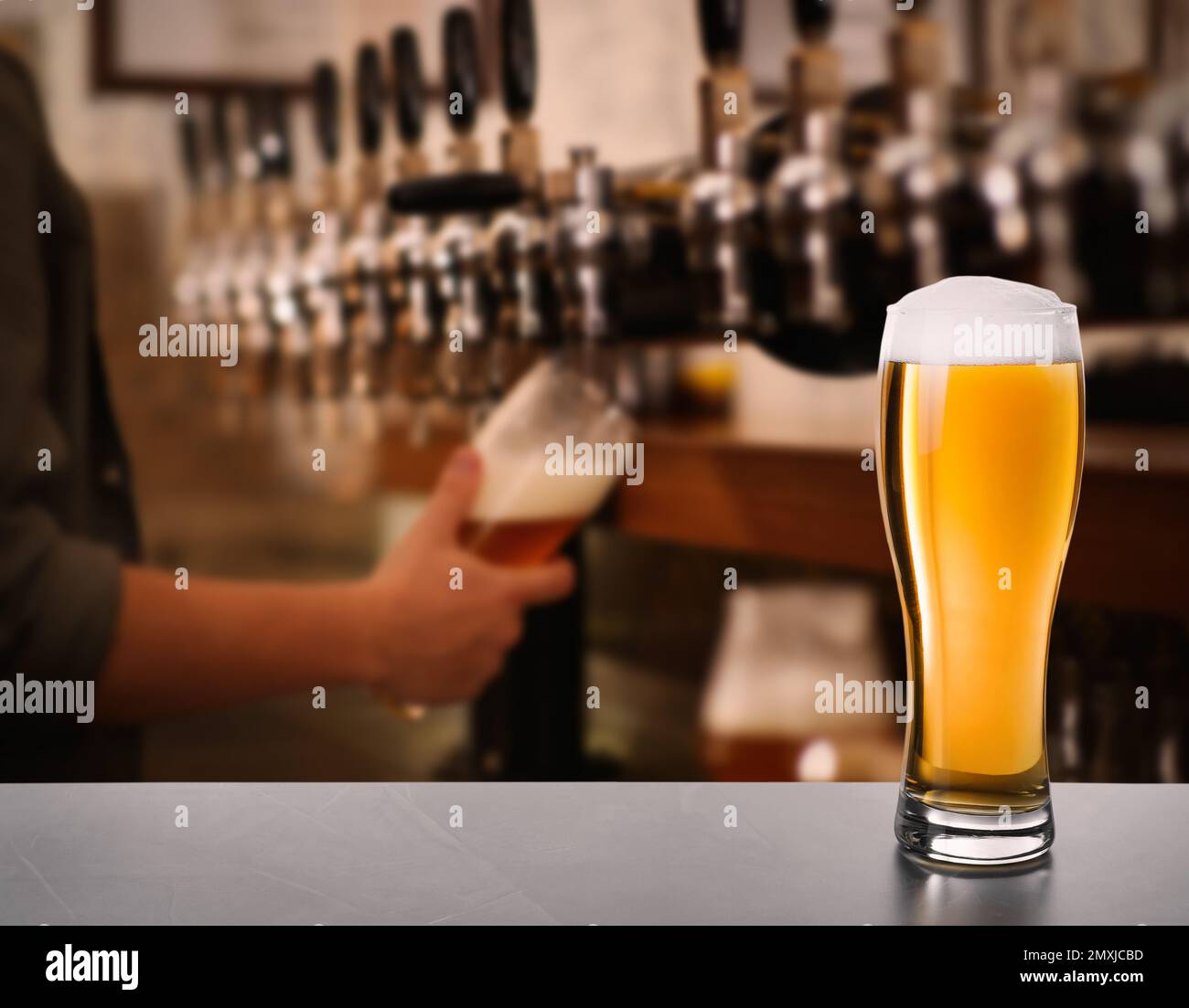 Man pouring beer in hop hi-res stock photography and images - Alamy