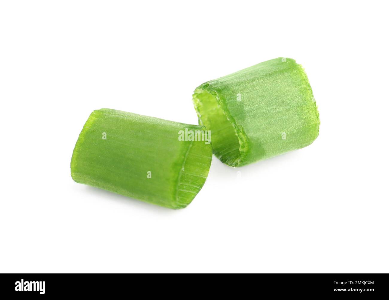 Pieces of green spring onion isolated on white Stock Photo - Alamy