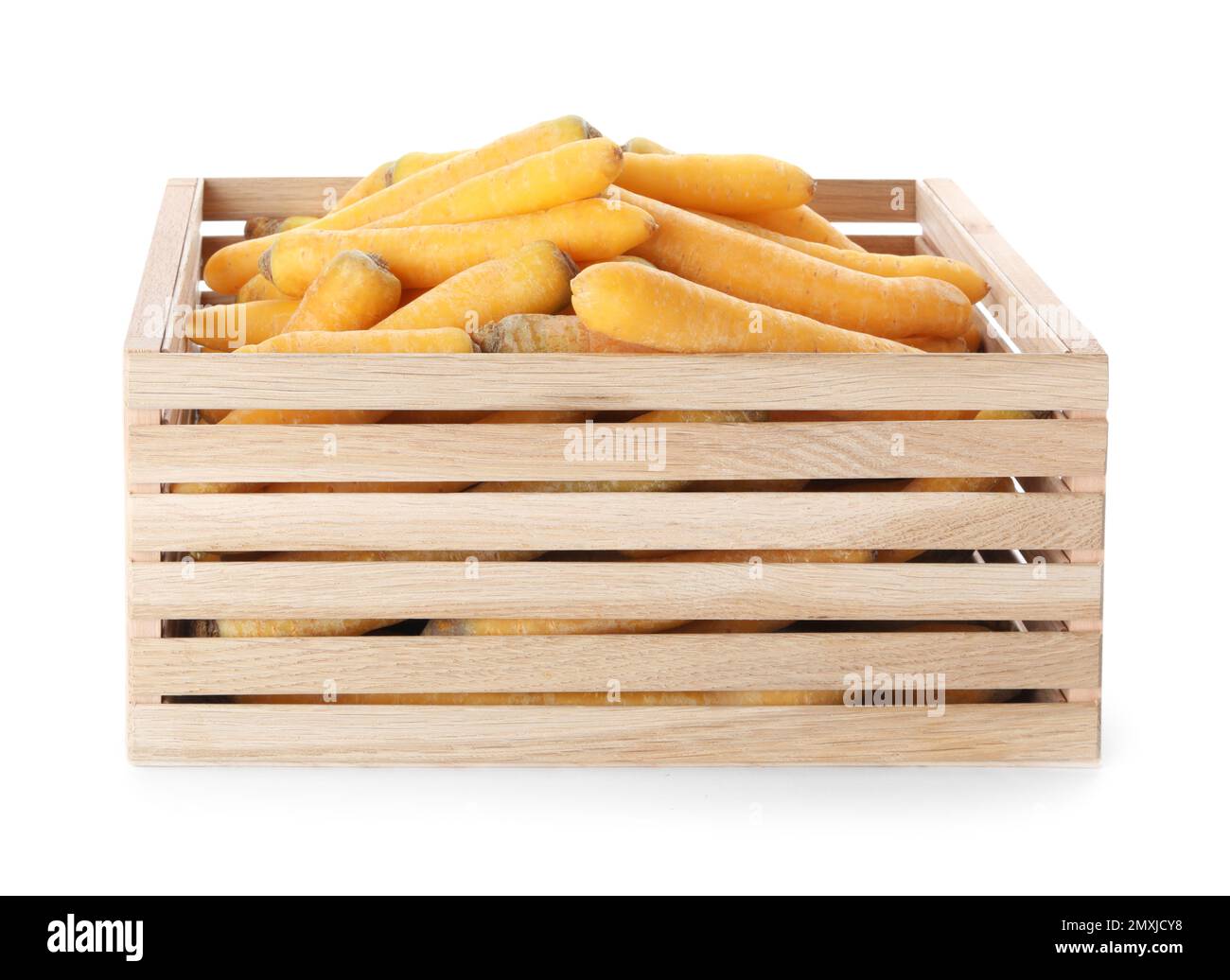 Carrot plant in wooden Cut Out Stock Images & Pictures - Alamy