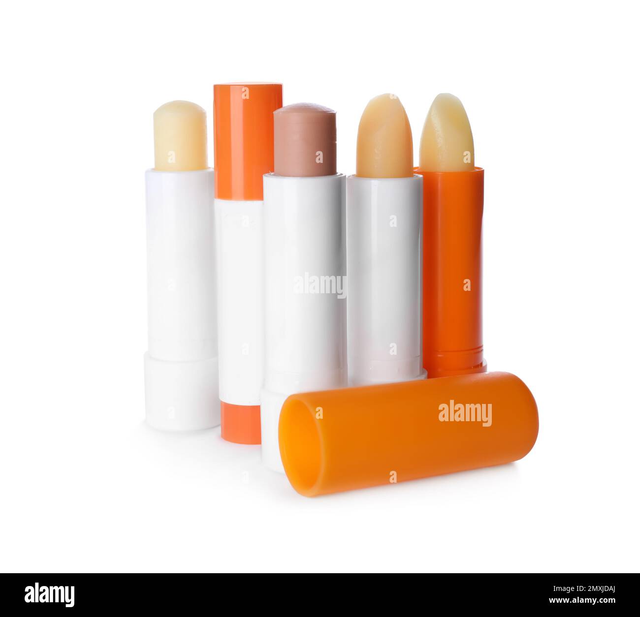 Sun protection lip balms on white background Stock Photo - Alamy