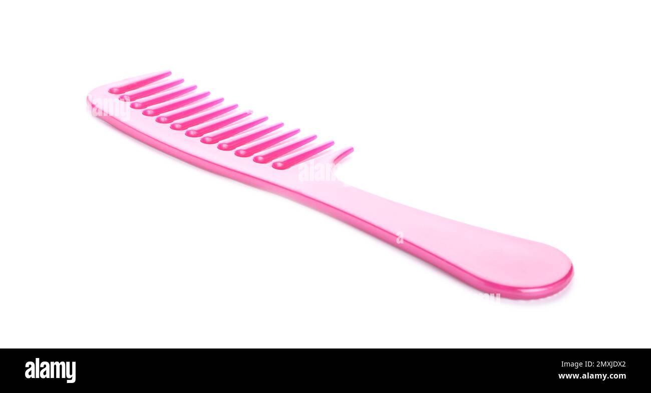 New pink hair comb isolated on white Stock Photo - Alamy