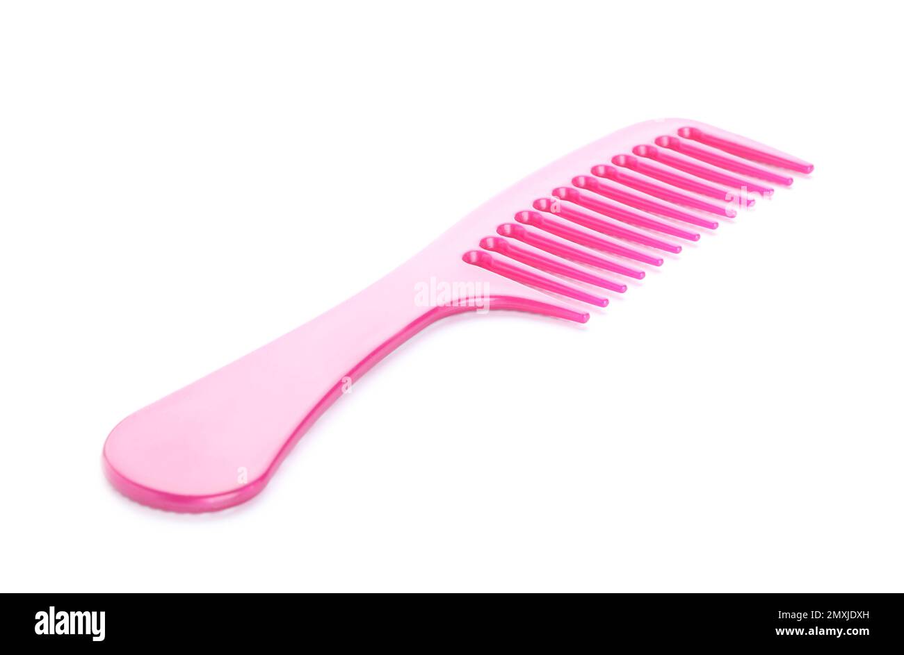 New pink hair comb isolated on white Stock Photo - Alamy
