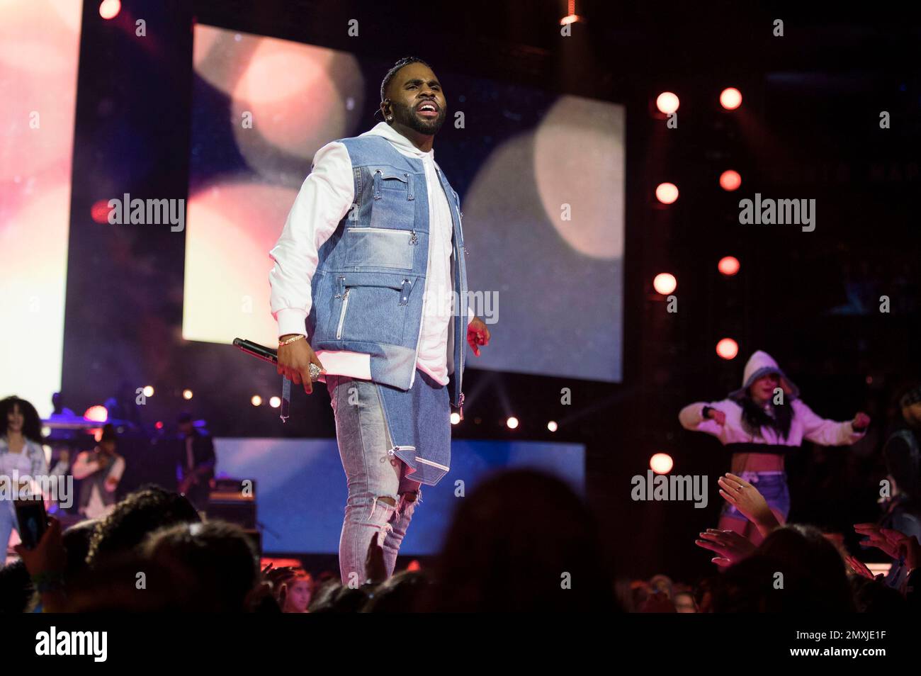 Jason Derulo seen on stage at WE Day on Wednesday, Oct. 19, 2016, in ...