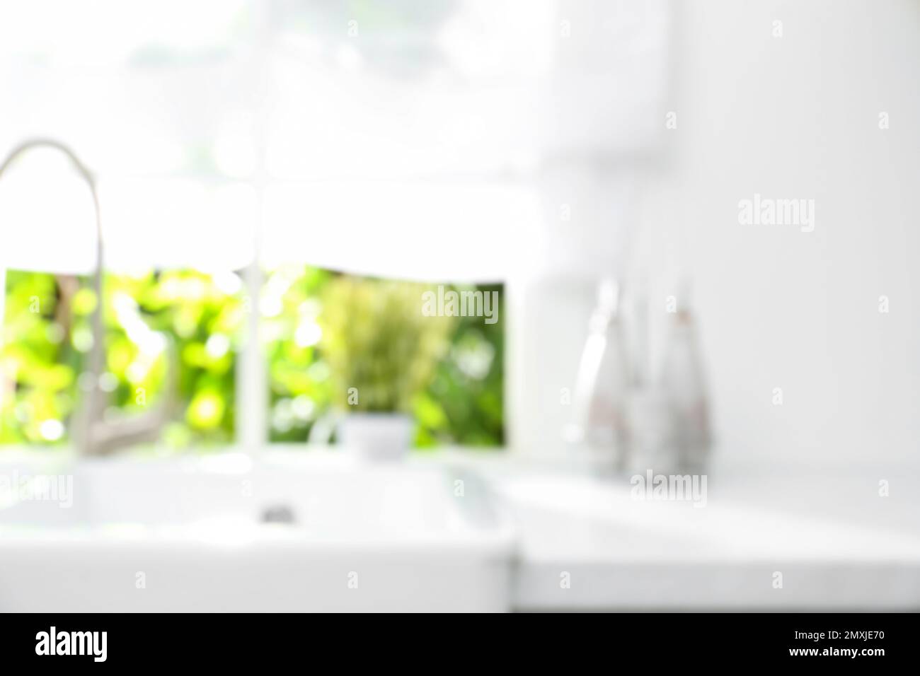 Blurred view of modern kitchen with window Stock Photo - Alamy