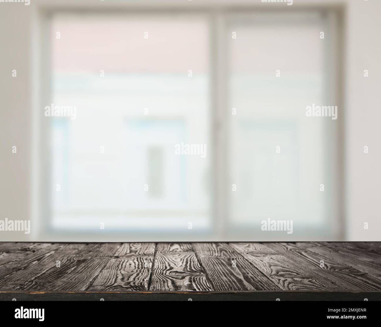 Empty wooden surface and blurred view of modern window Stock Photo - Alamy