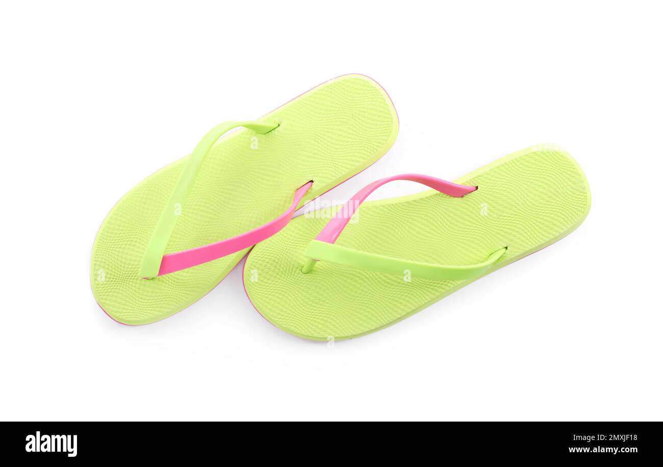 Pair of stylish green flip flops isolated on white, top view. Beach ...