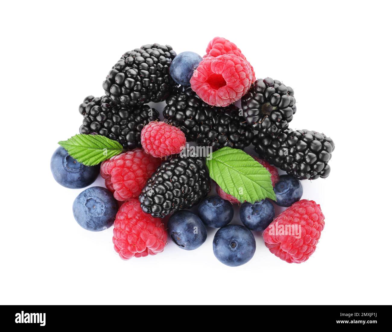 Pile of different ripe tasty berries with green leaves isolated on ...