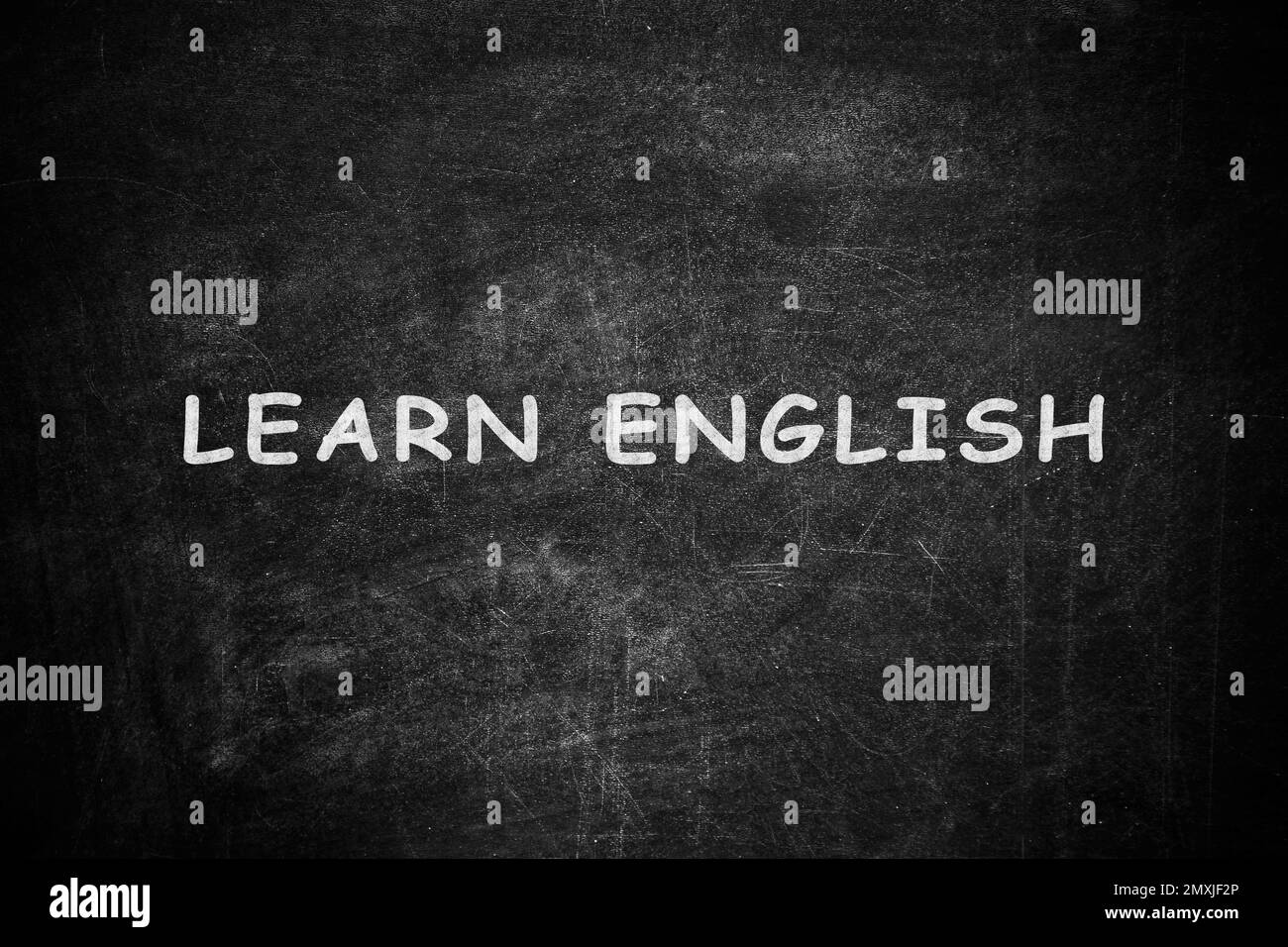 Black chalkboard with text Learn English Stock Photo - Alamy