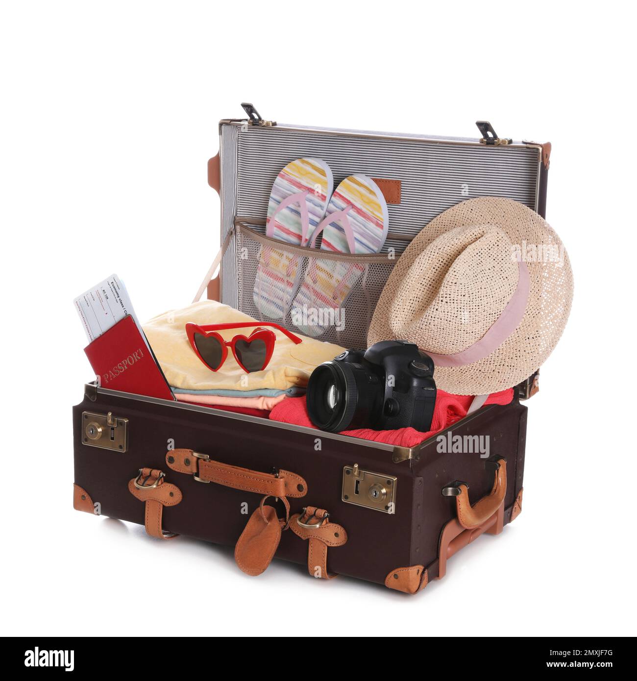 Open vintage suitcase with clothes packed for summer vacation isolated on white Stock Photo - Alamy