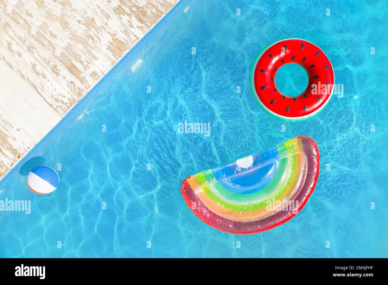 Blue beach ball pool ring hi-res stock photography and images - Alamy