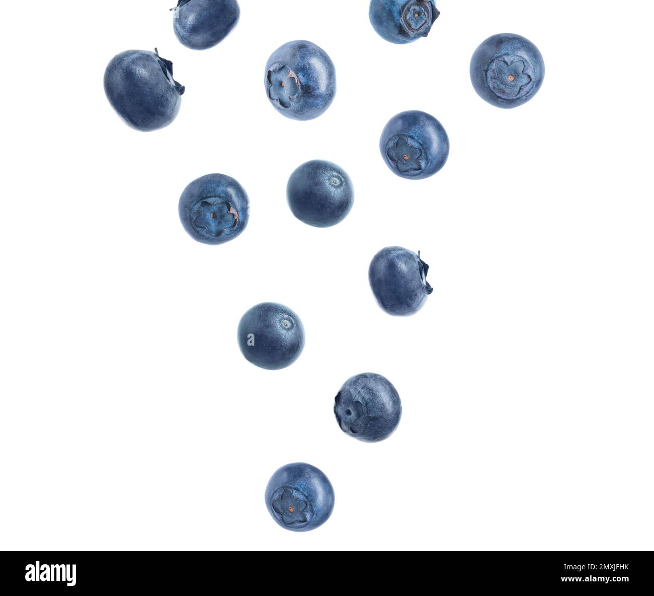 Fresh ripe blueberries falling on white background Stock Photo - Alamy