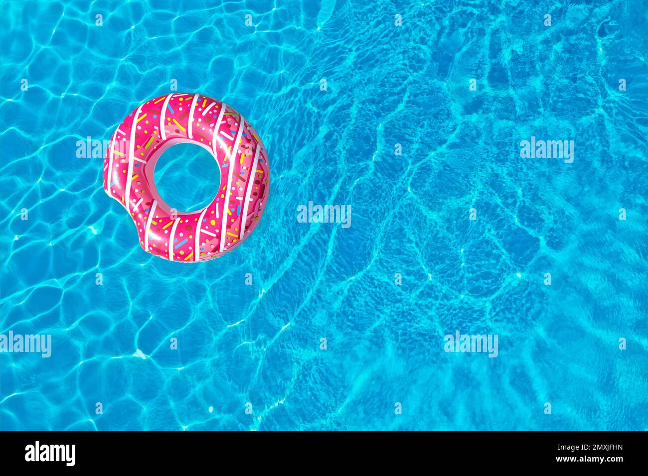 Swimming pool with inflatable ring, top view. Space for text Stock ...