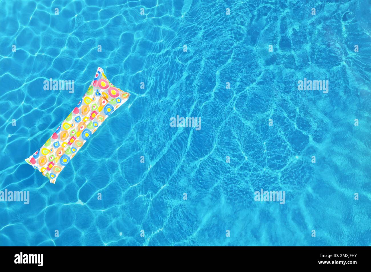 Swimming pool with inflatable mattress, top view. Space for text Stock ...