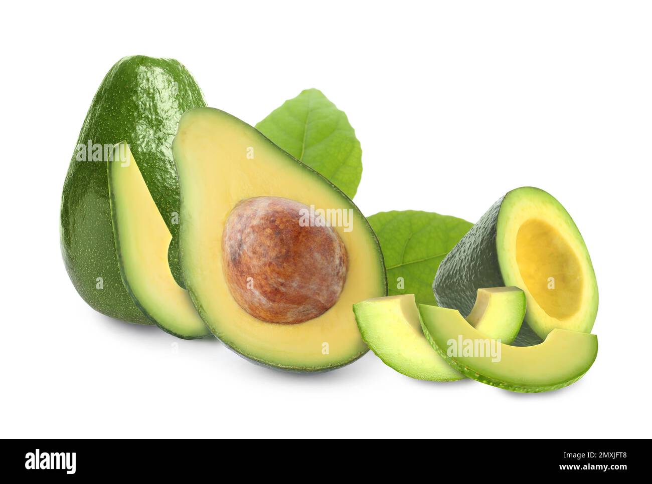 Cut and whole fresh avocados on white background Stock Photo - Alamy